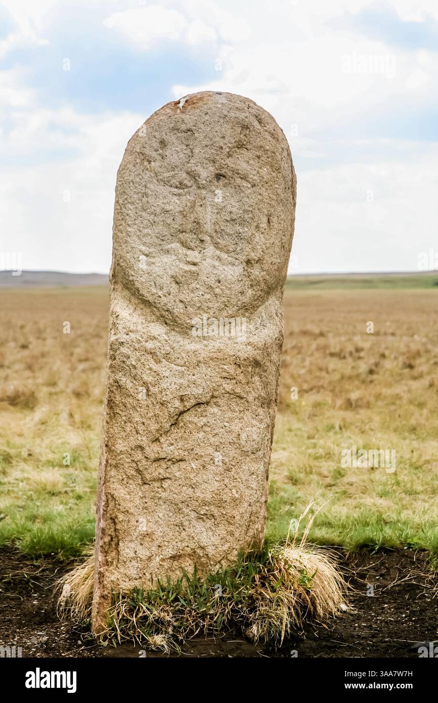Arkaim in Ural Russia. A large stone baba with a face carved into it ...