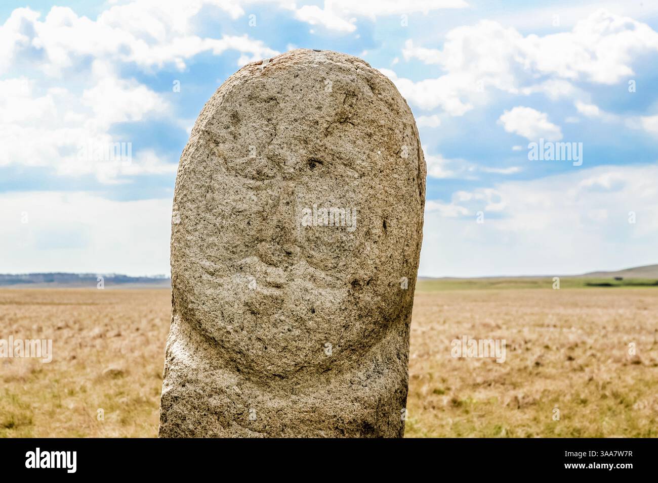 Arkaim in Ural Russia. A large stone baba with a face carved into it ...