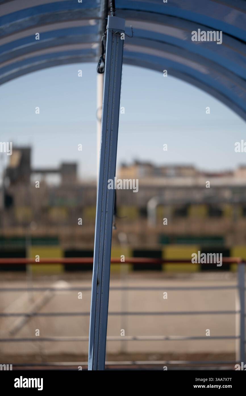 Broken light bulb hanging on pedestrian bridge Stock Photo - Alamy