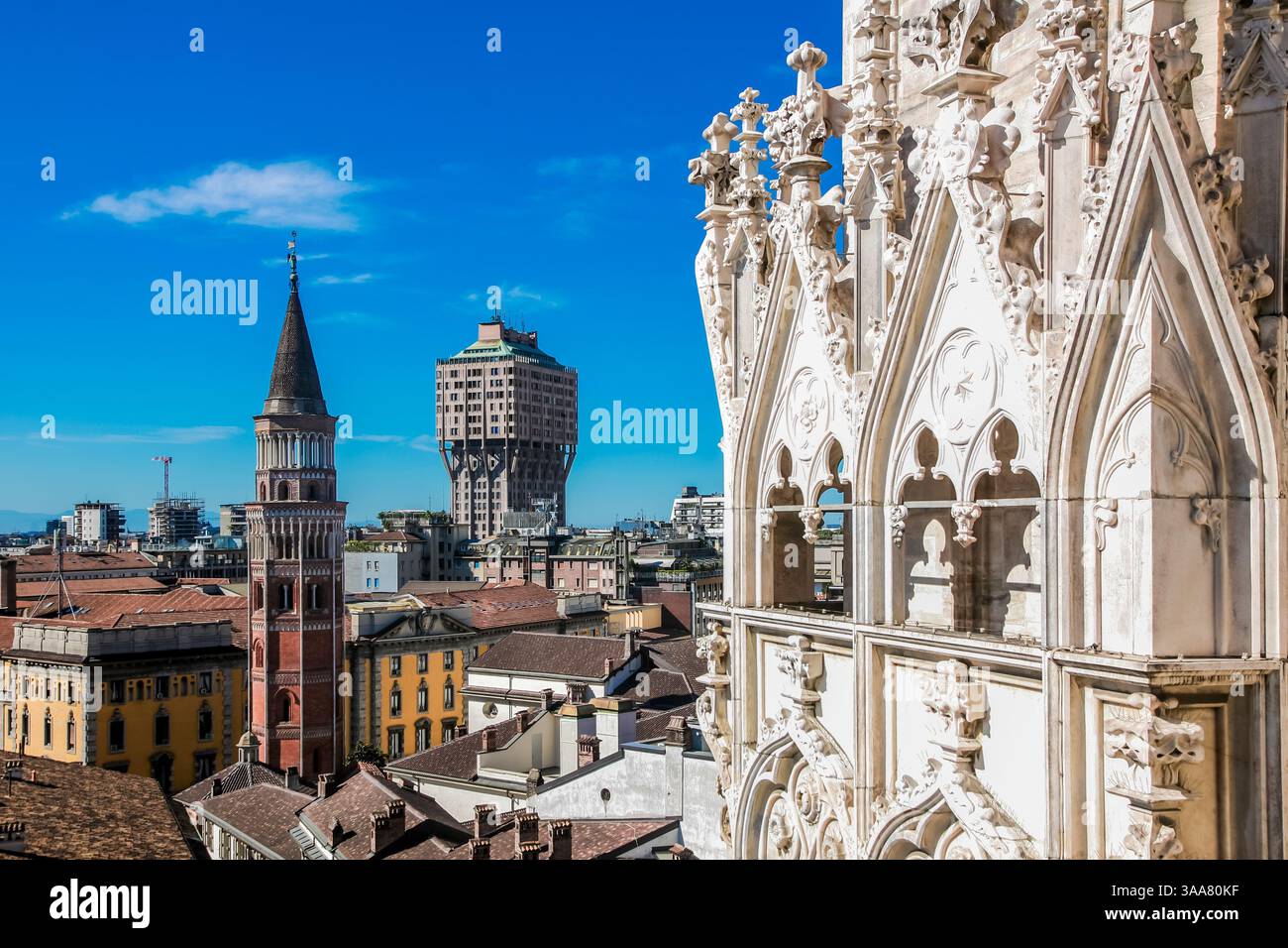 A city view in Milano Italy with a tall building in the middle. The ...