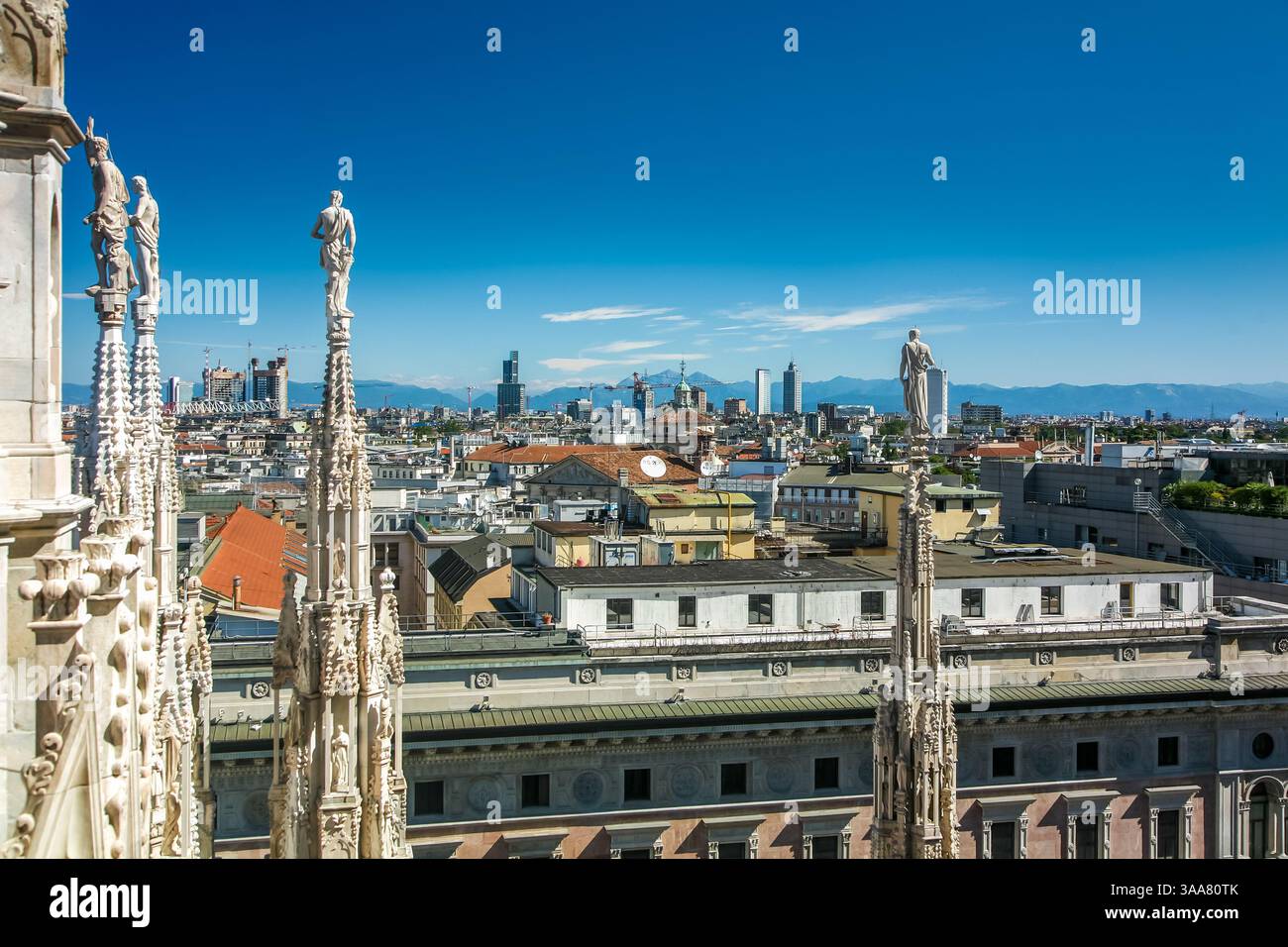 A city view in Milano Italy with a tall building in the middle. The ...