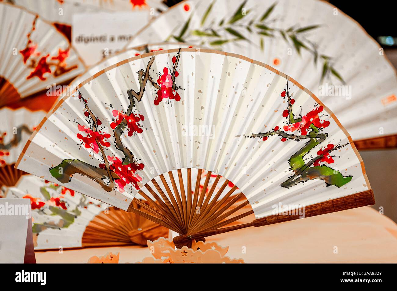 Japanese fan in hand hi-res stock photography and images - Alamy