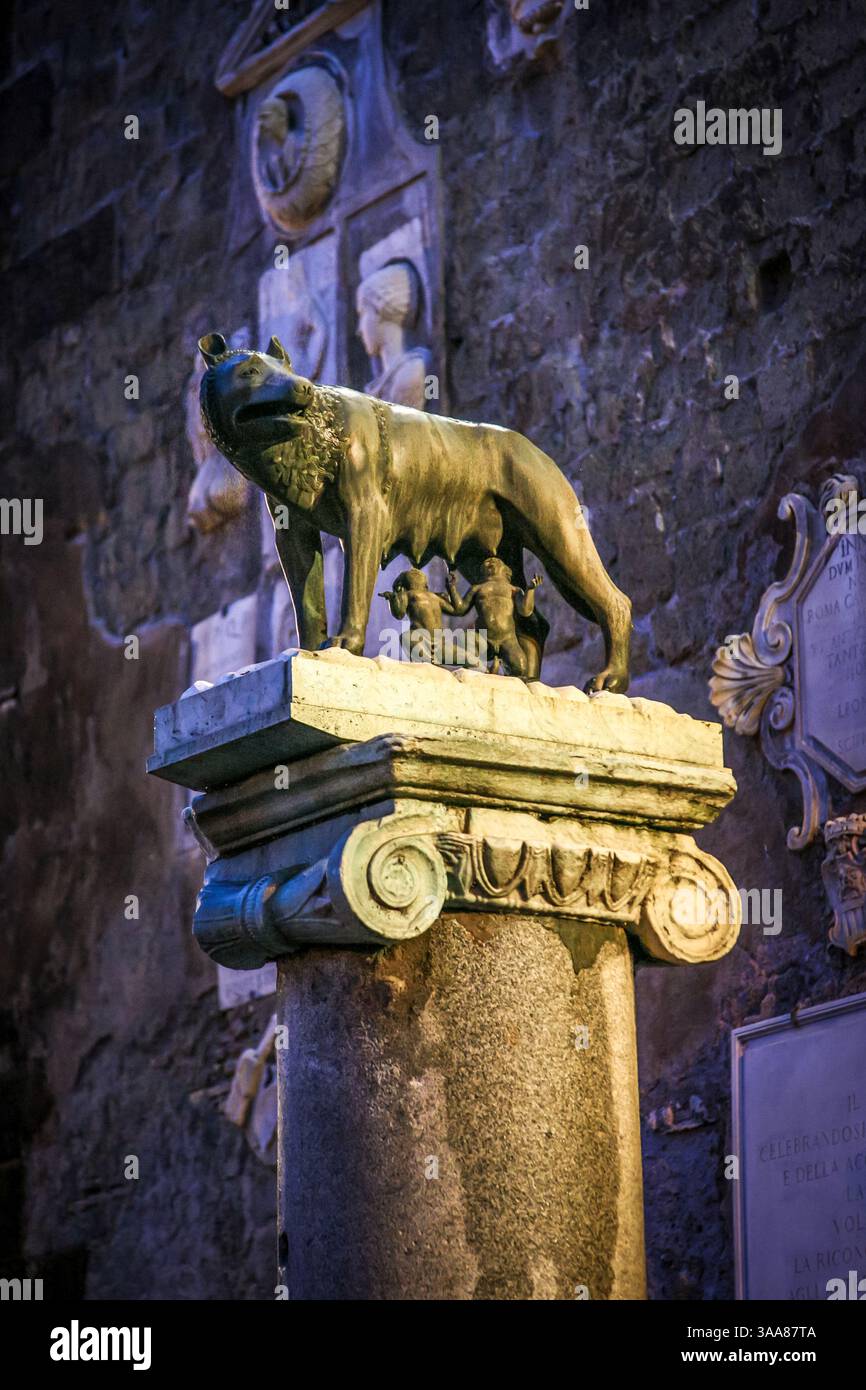 A statue of a wolf with Remus and Romulus in Roma Italy is on top of a ...