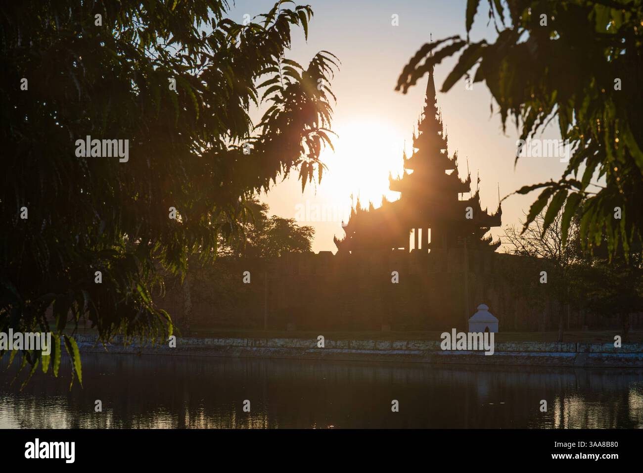 Gorgeous and beautiful sunset by the moat of the Mandalay Palace in ...