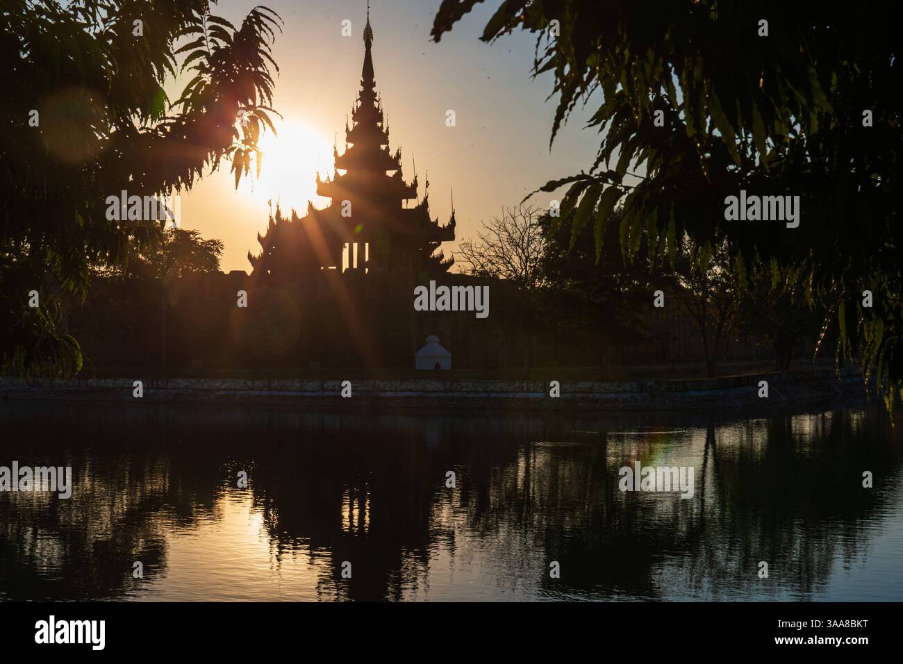Gorgeous and beautiful sunset by the moat of the Mandalay Palace in ...
