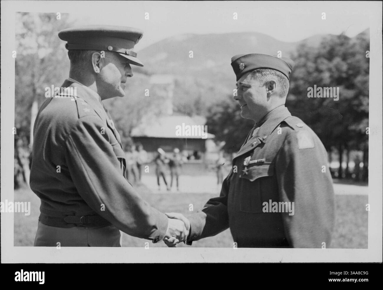 Lieutenant General Truscott, commander of the Fifth Army, awards the ...