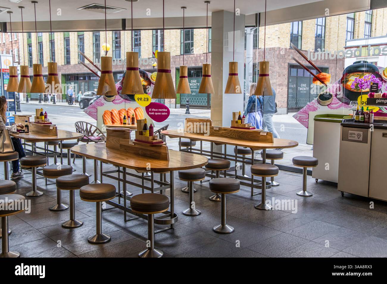 London, UK- August 6, 2023: Interior of Itsu Japanese restaurant in ...