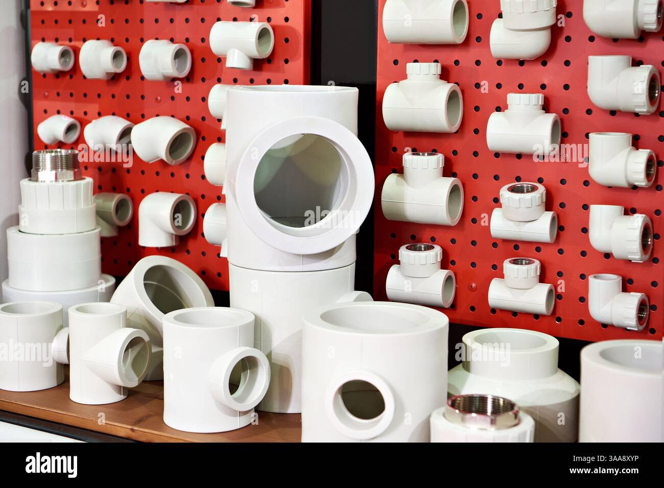 Polypropylene fittings for plumbing on exhibition in store Stock Photo ...