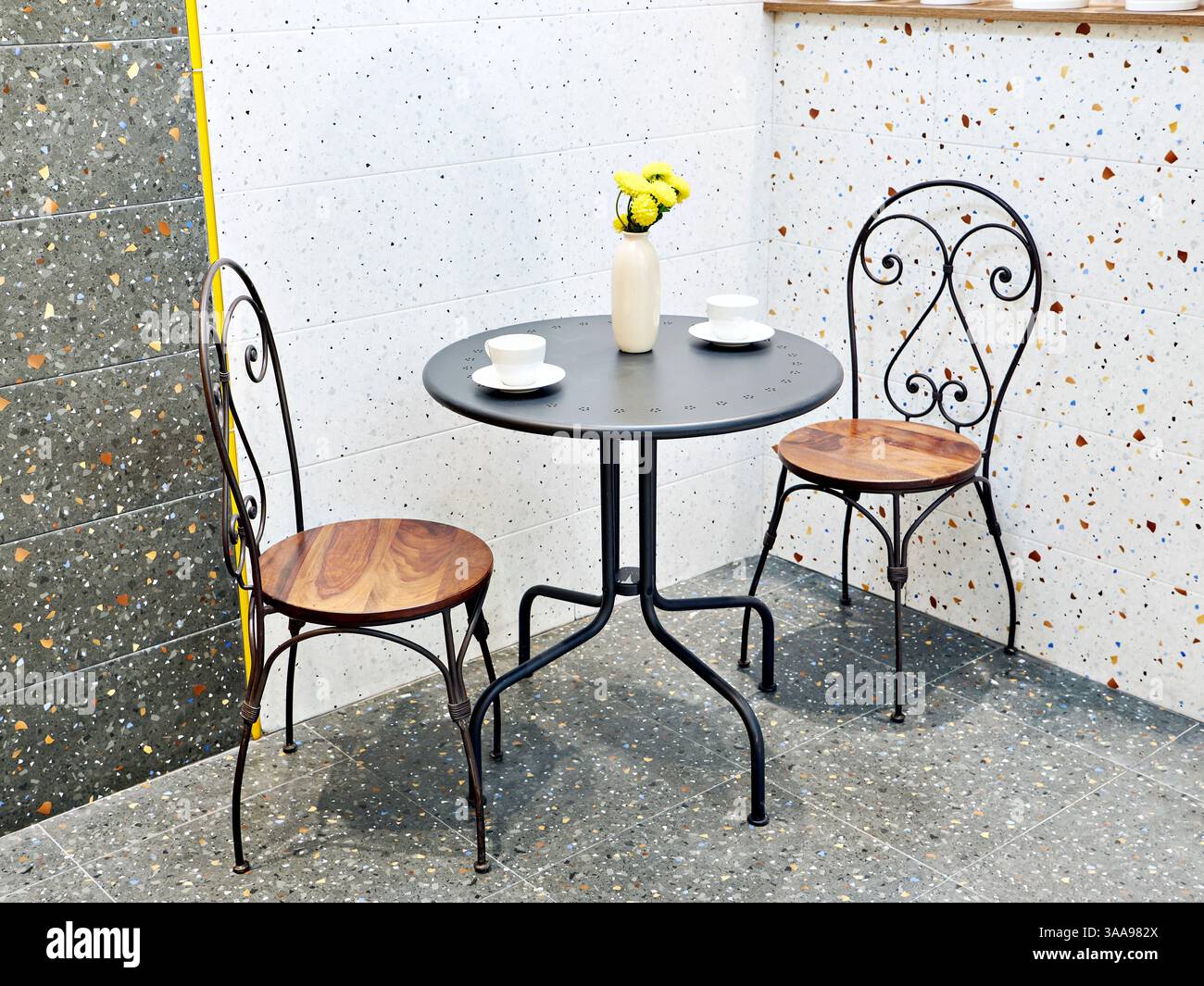Vintage table and chairs on marble tiles on cafe terrace Stock Photo ...