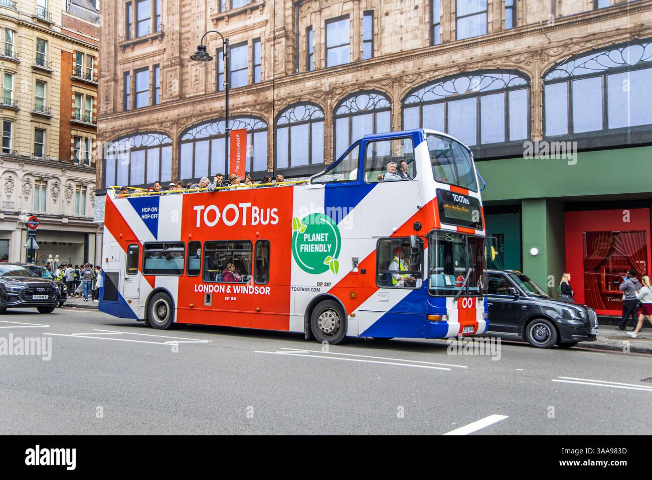 London, UK- August 6, 2023: Toot Bus, London touring bus taking ...