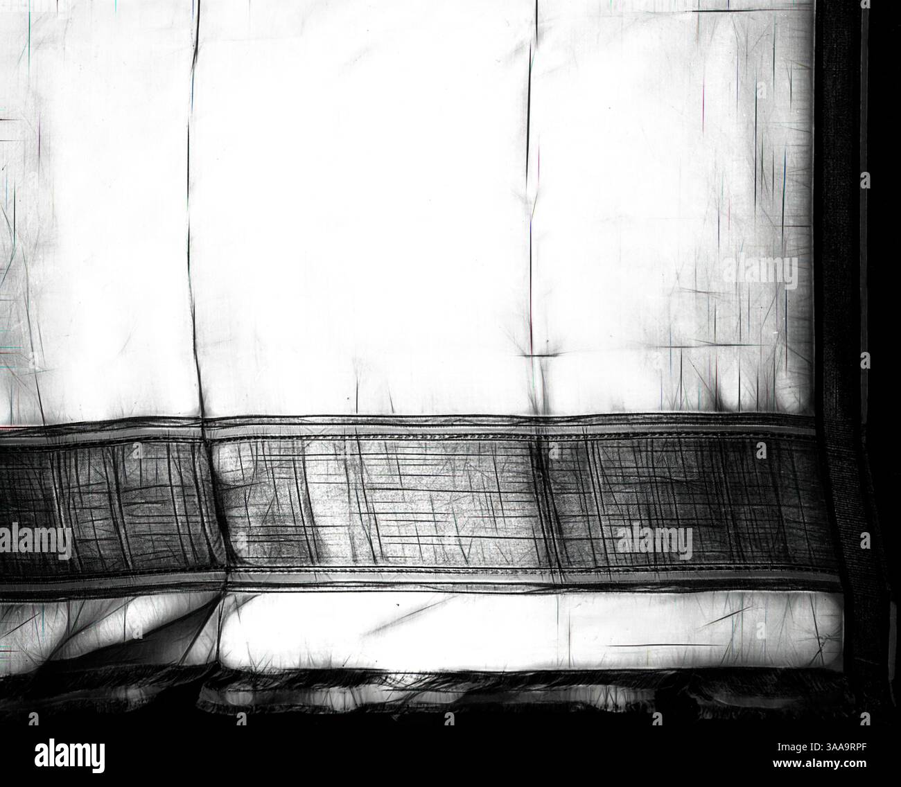 A textured fabric drapes elegantly, featuring a bold, dark border that ...