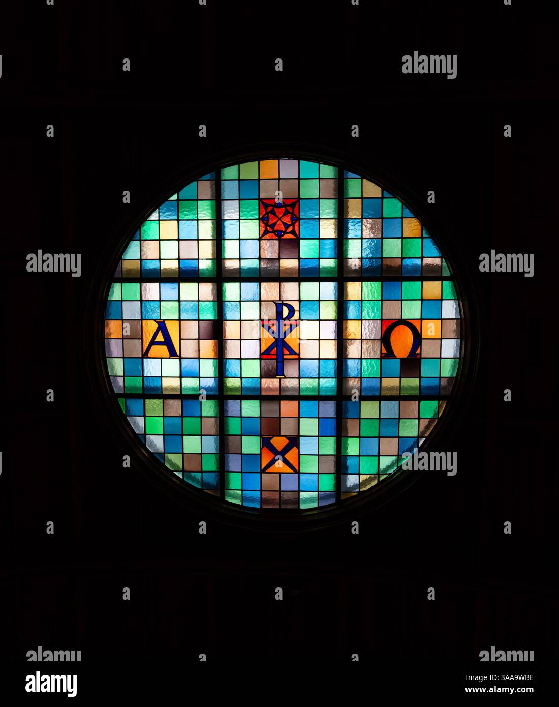 Michaelbeuern, Austria - October 22, 2024: A circular stained glass ...