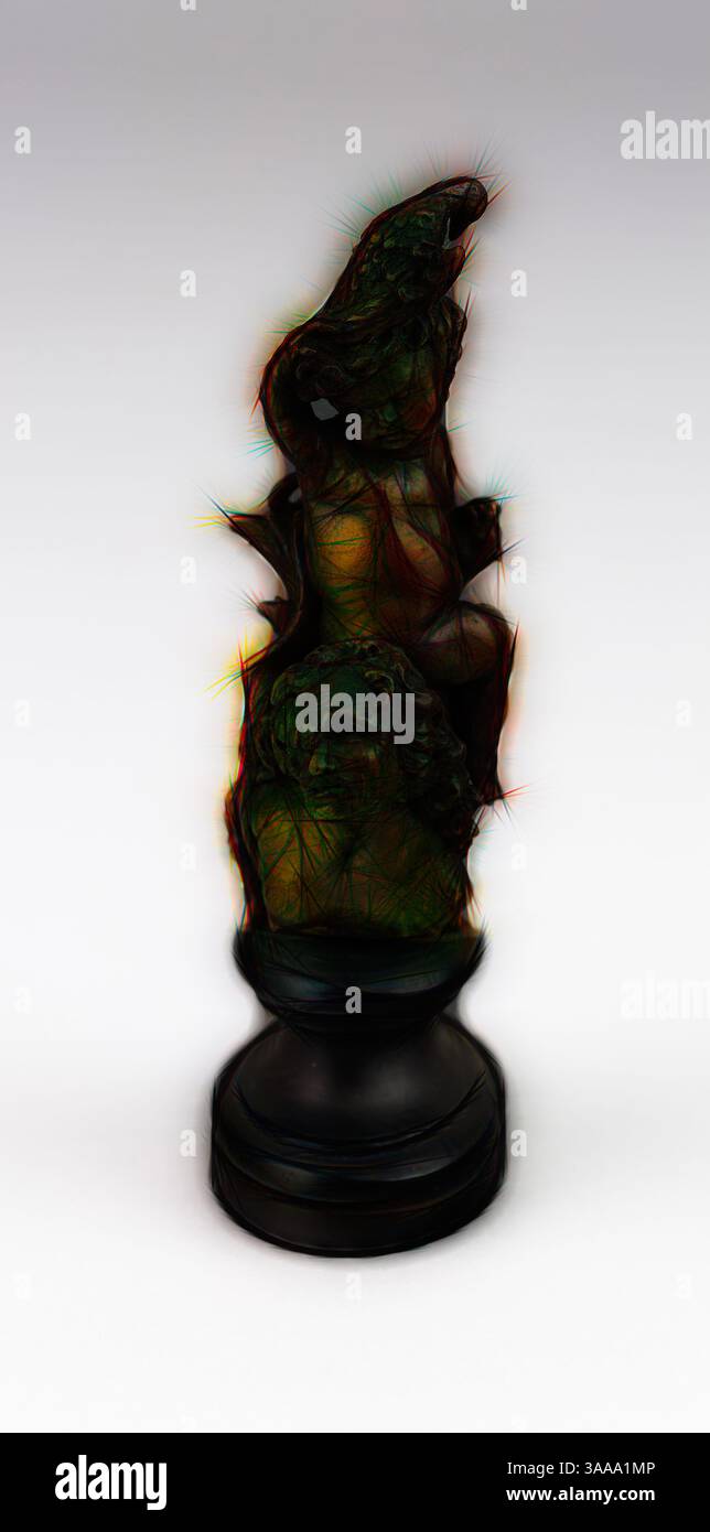 A sculptural piece featuring intertwined figures with intricate details ...