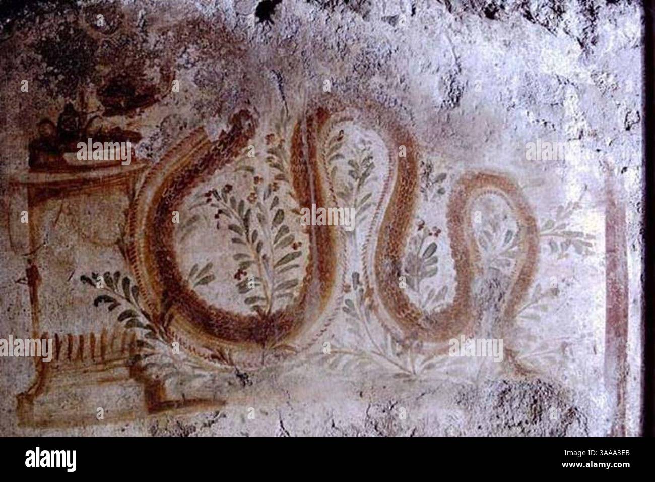 I.12.8 Pompeii. 1968. Room 10, north wall with lararium painting Stock ...
