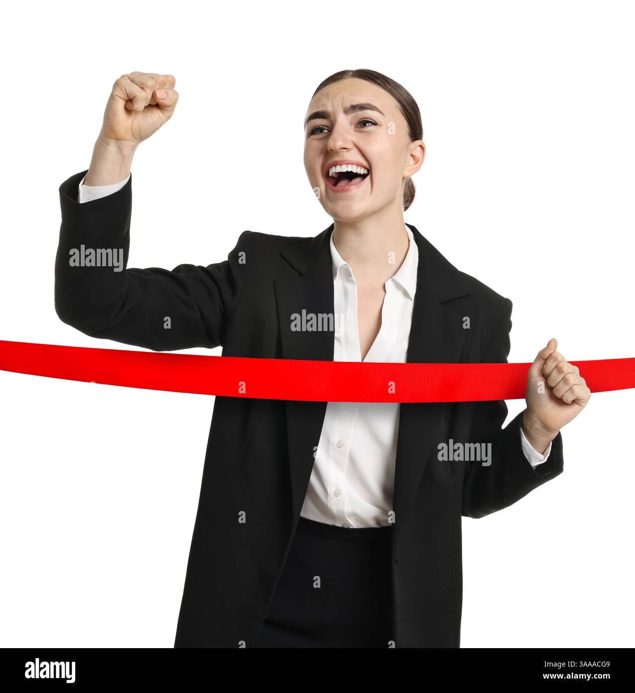 Happy businesswoman crossing red finish line ribbon on white background ...
