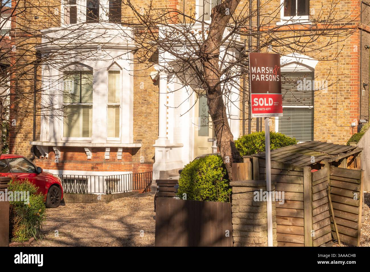 LONDON- MARCH 31, 2025: Estate agent Sold sign outside residential ...