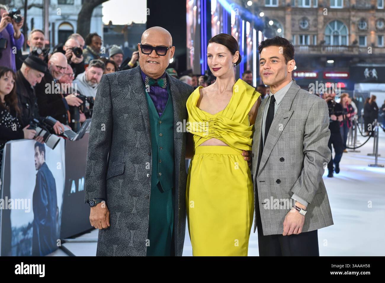 Rami Malek, from left, Laurence Fishburne, and Caitriona Balfe pose for ...