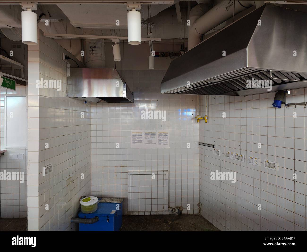 Empty Commercial Kitchen with Stainless Steel Ventilation Hoods Stock ...