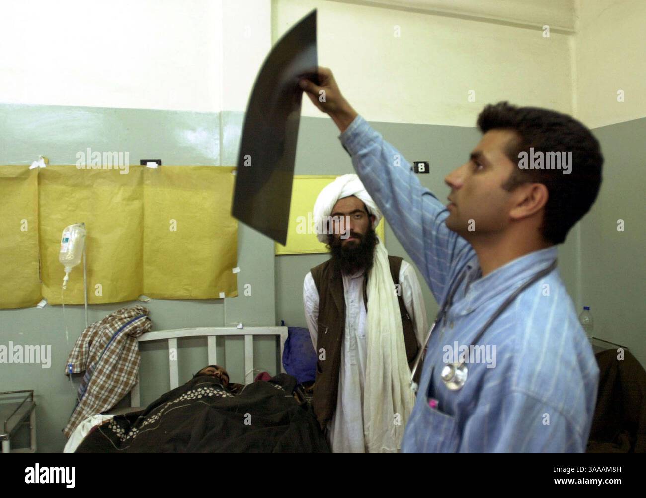 Oct 23, 2001; Quetta, Pakistan; Afghan refugee MATI ULLAH watches as Dr ...