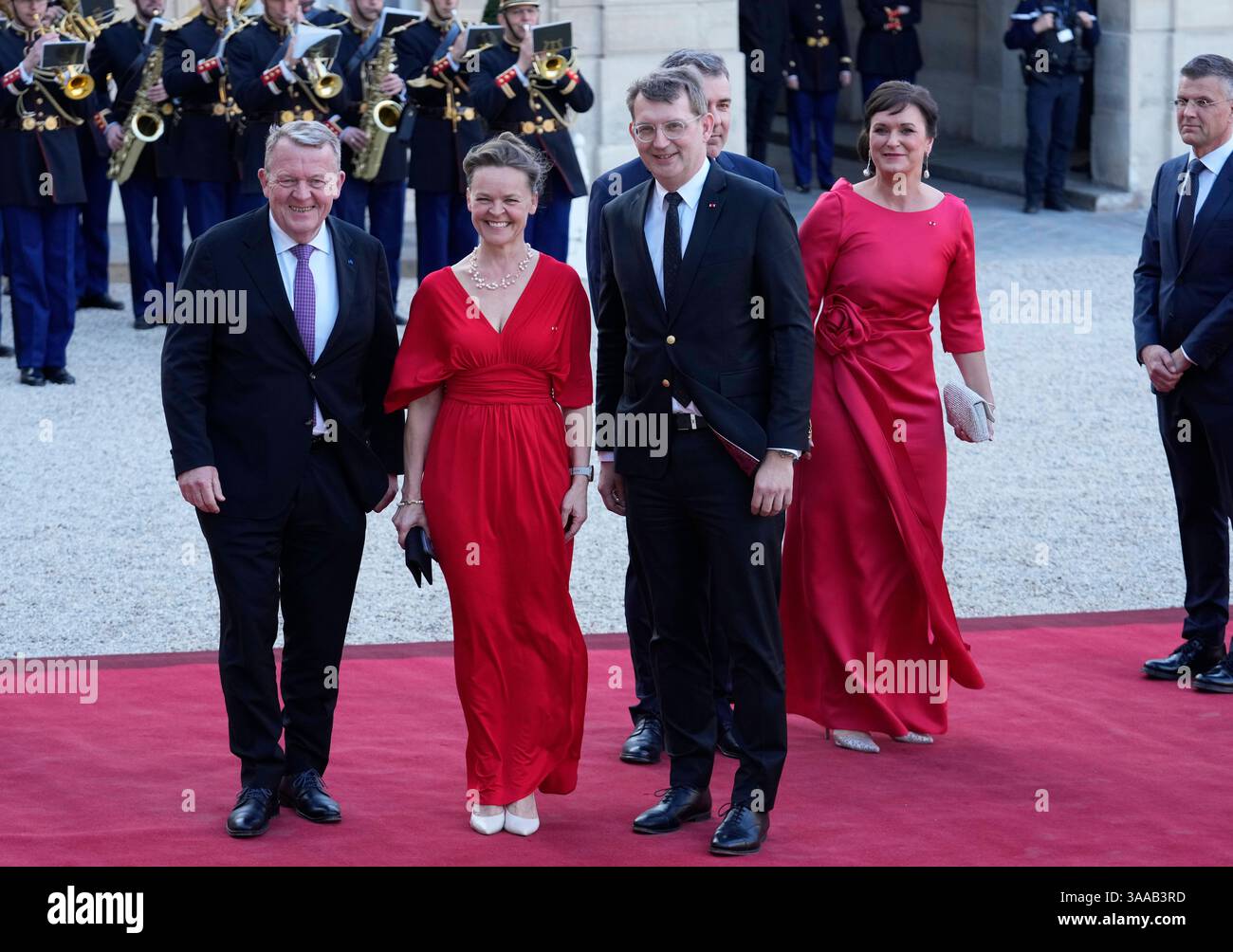 Danish Foreign Minister Lars Lokke Rasmussen, left, his wife Solrun ...