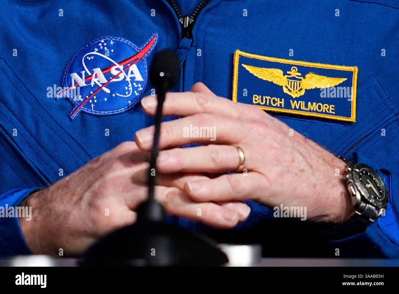 Astronaut Butch Wilmore talks to reporters during a press conference at ...