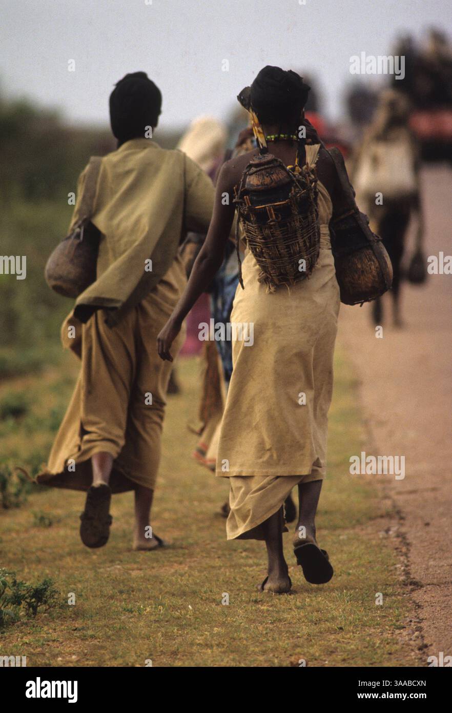 Aug 14, 1992; Afgoi, SOMALIA; A Somali women travel on the road between ...