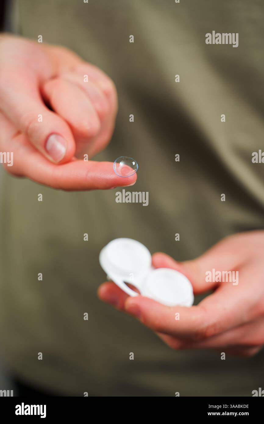 Eyesight correction with optical lens. Closeup contact lens for vision ...