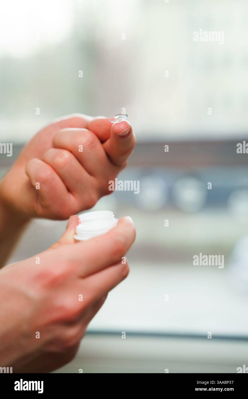 Eyesight correction with optical lens. Closeup contact lens for vision ...