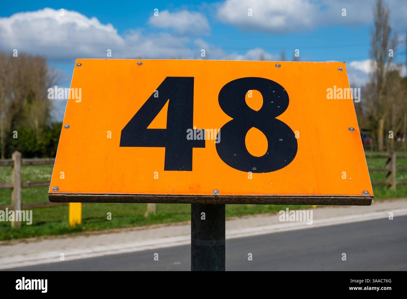 Number 48 on orange background, signalisation of underground gas ...