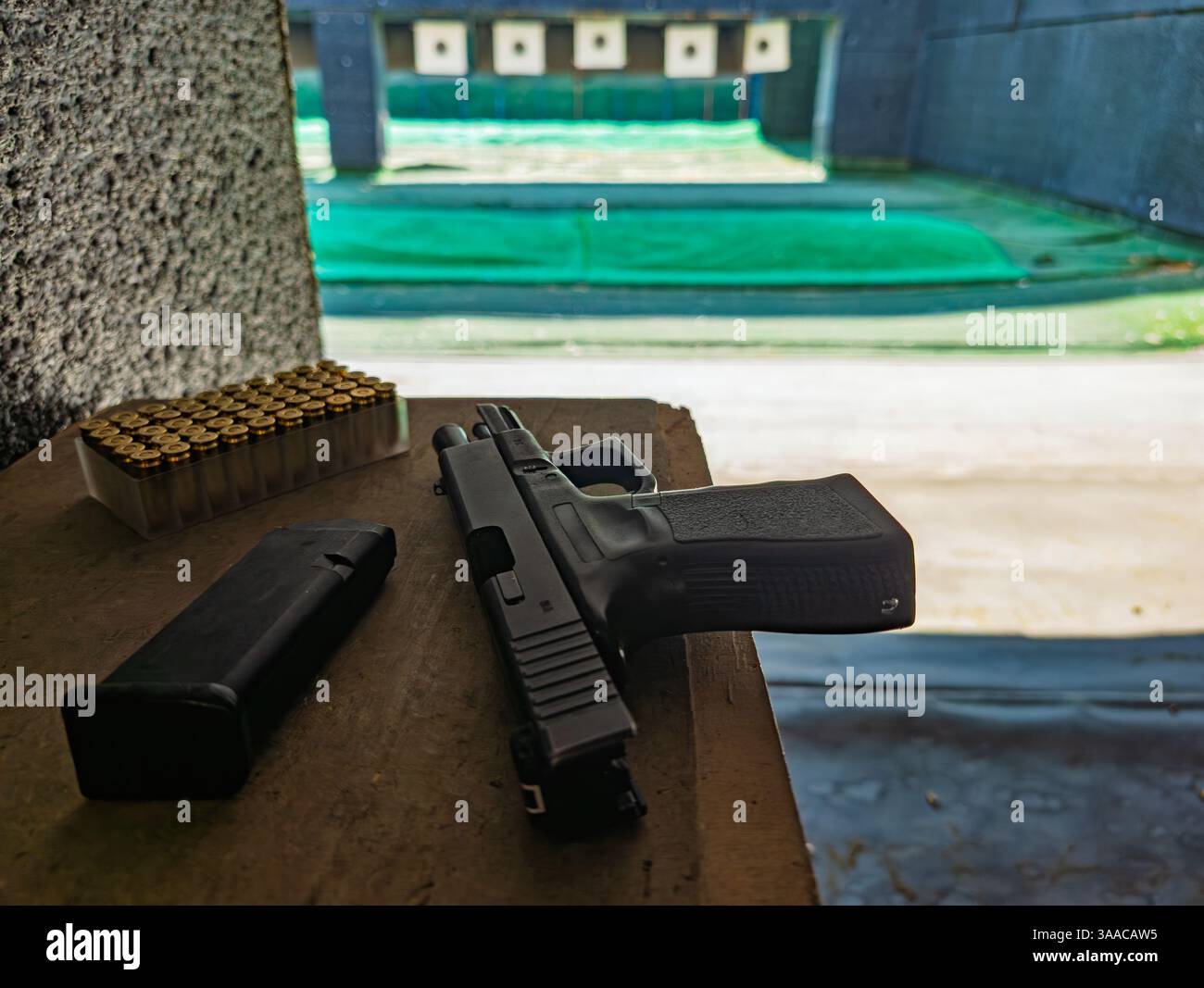 Pistol in a shooting range Stock Photo - Alamy