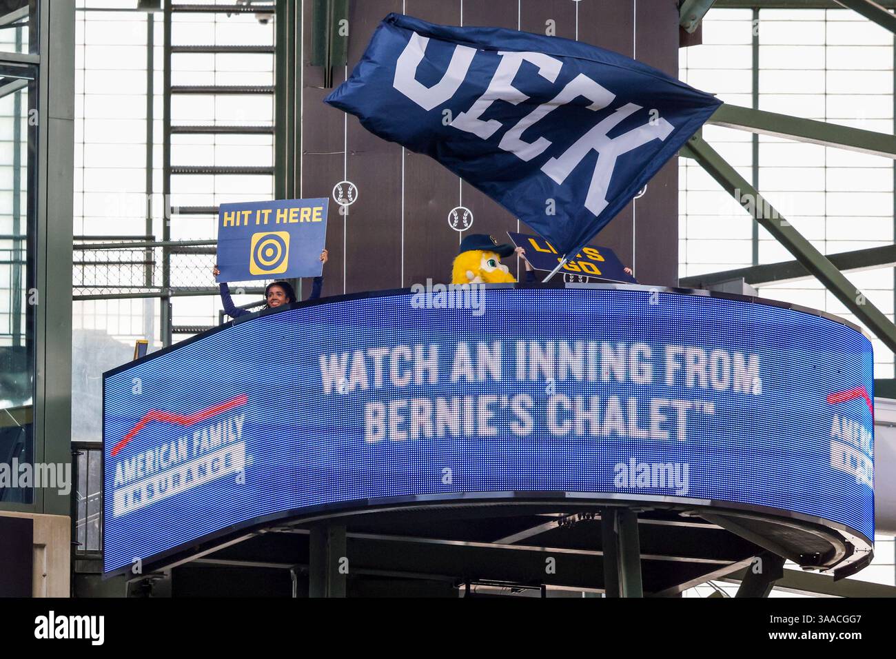 MILWAUKEE, WI - MARCH 31: Brewer mascot Bernie Brewer waves a flag ...