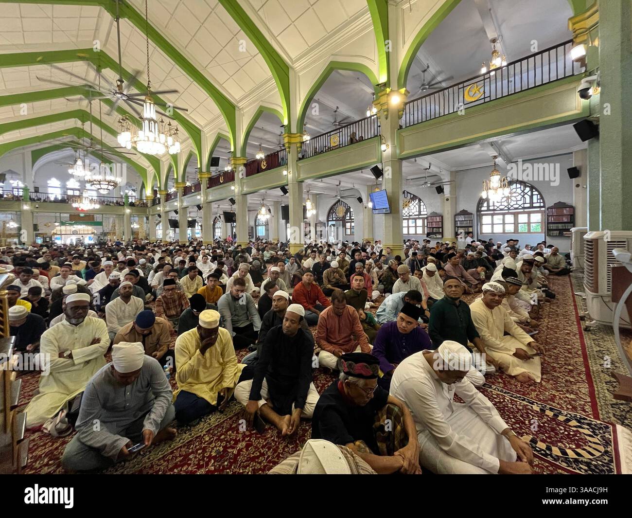 Eid al-Fitr in Singapore Muslims attend Eid al-Fitr prayers at the ...