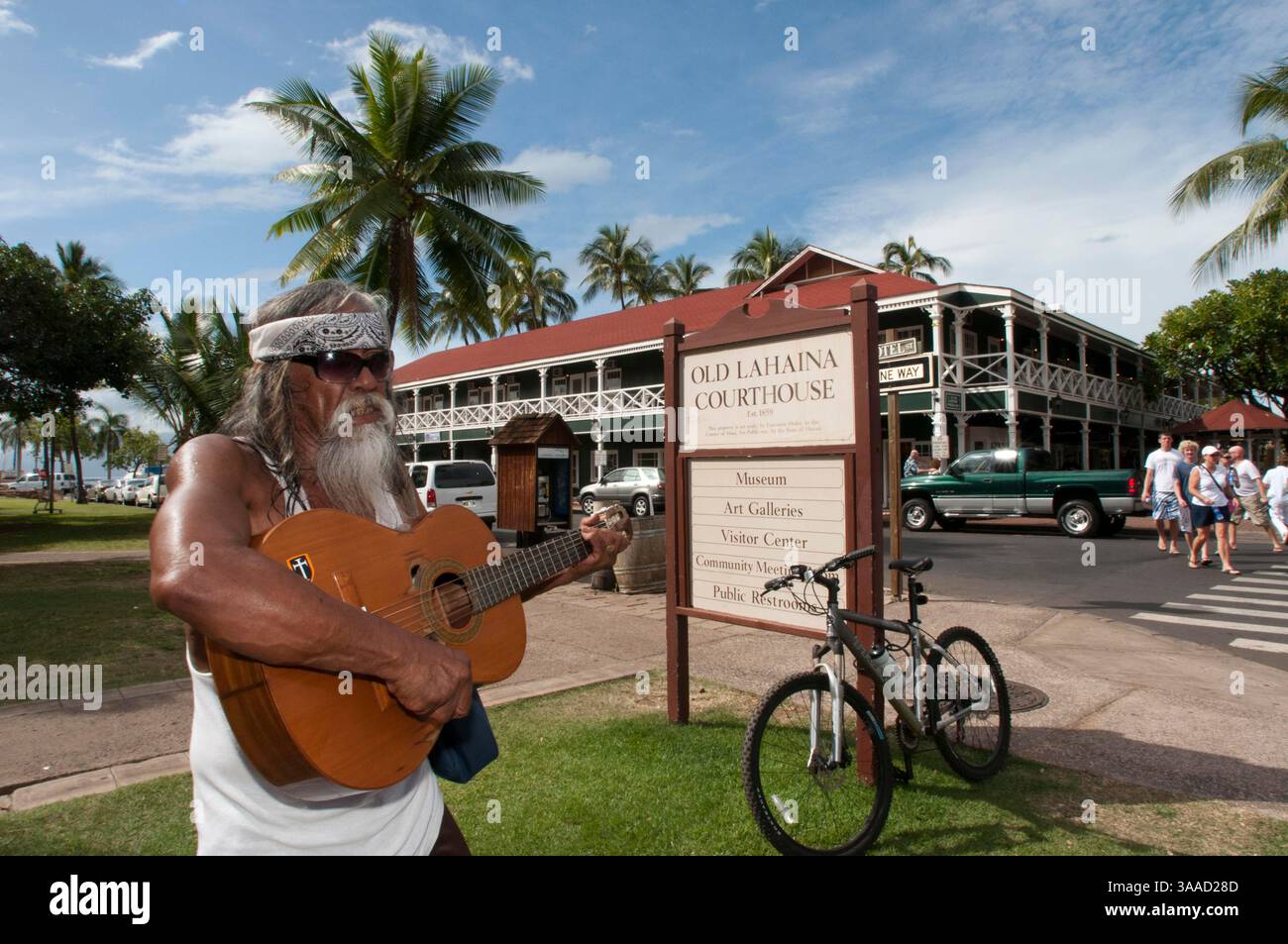 Dec 30, 2014 - Hawaii, U.S. - Hippye Playing guitar near the emblematic ...