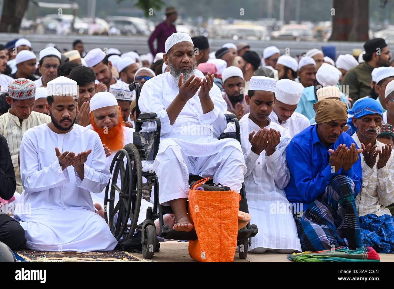 KOLKATA, INDIA - MARCH 31: A physically disabled Muslim devotee offer a ...