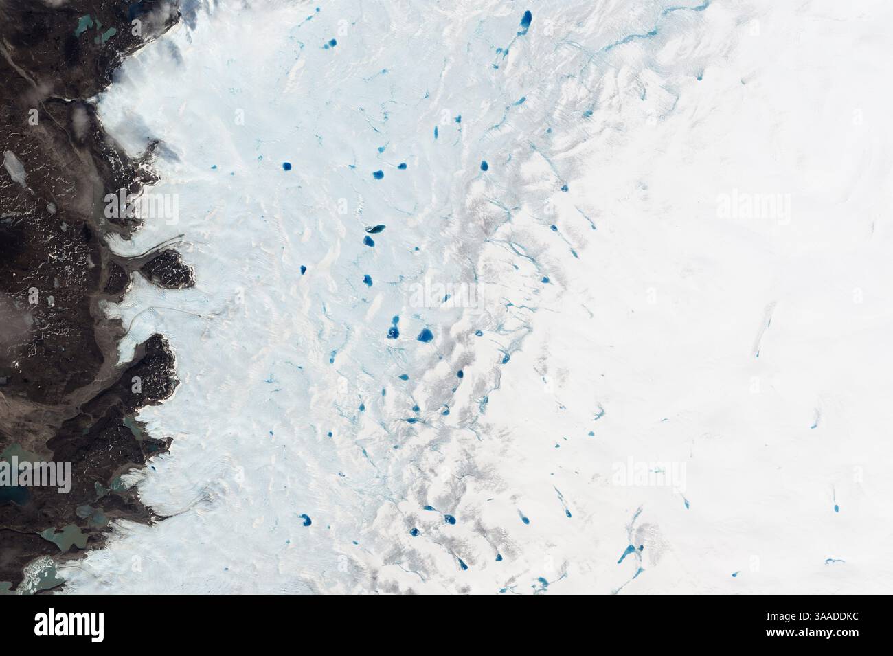 July 2, 2013 - Greenland - Springtime ice melt forming pools of blue ...