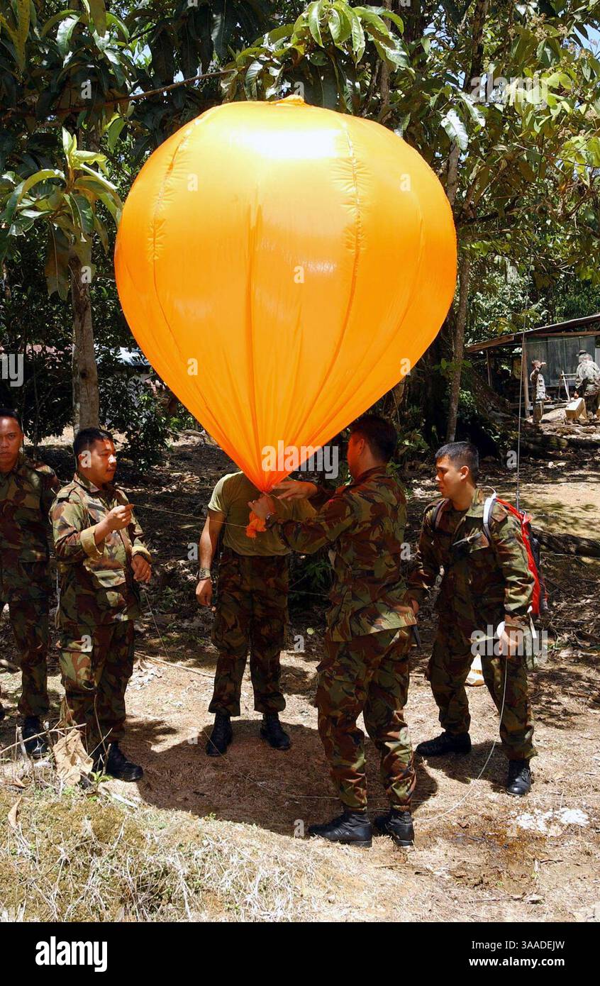 In Brunei Darussalam, members of the Royal Brunei Air Force launch a ...