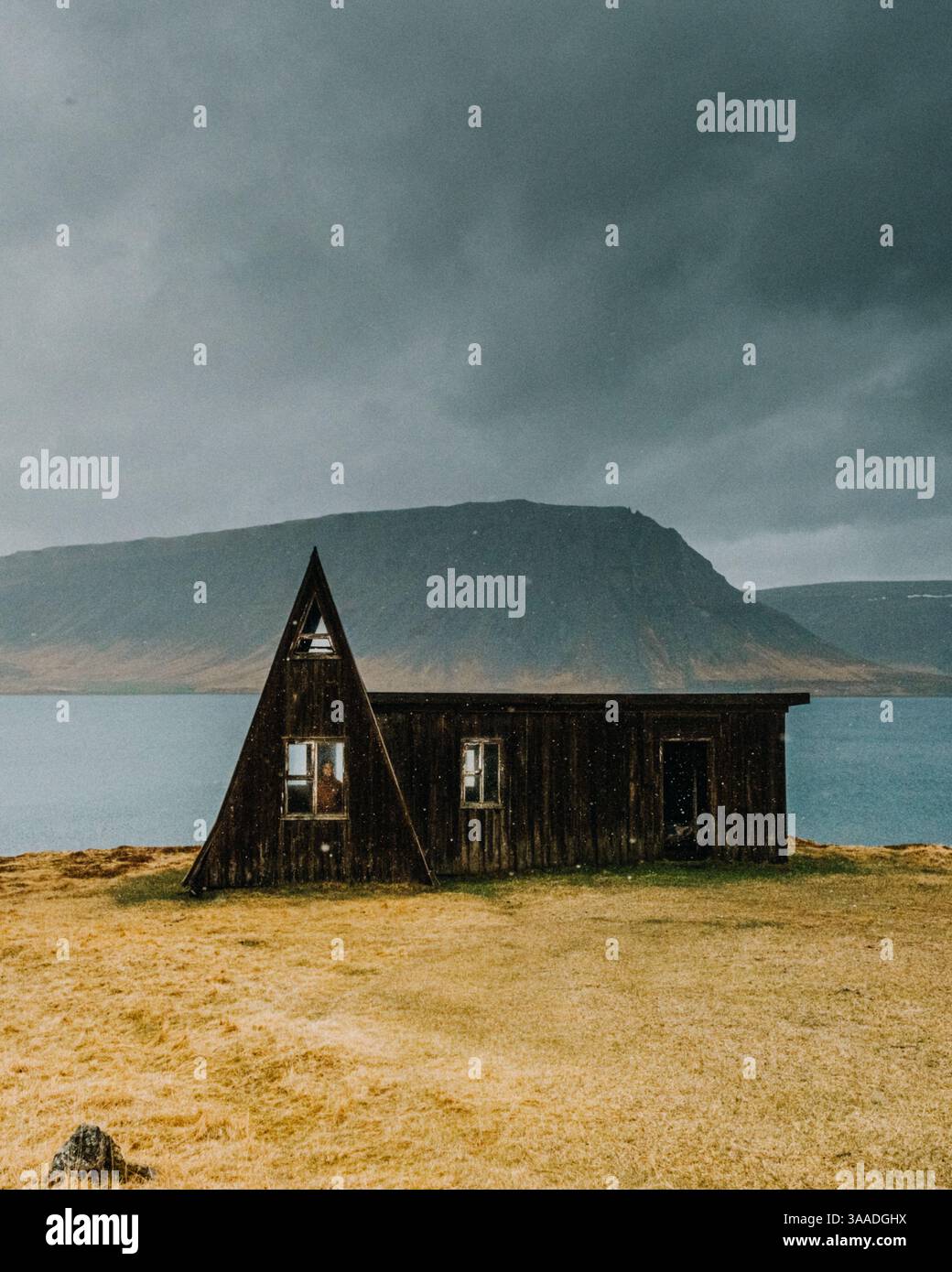 Abandoned A-frame barn near Fossfjordur fjord in Westfjords, Iceland ...