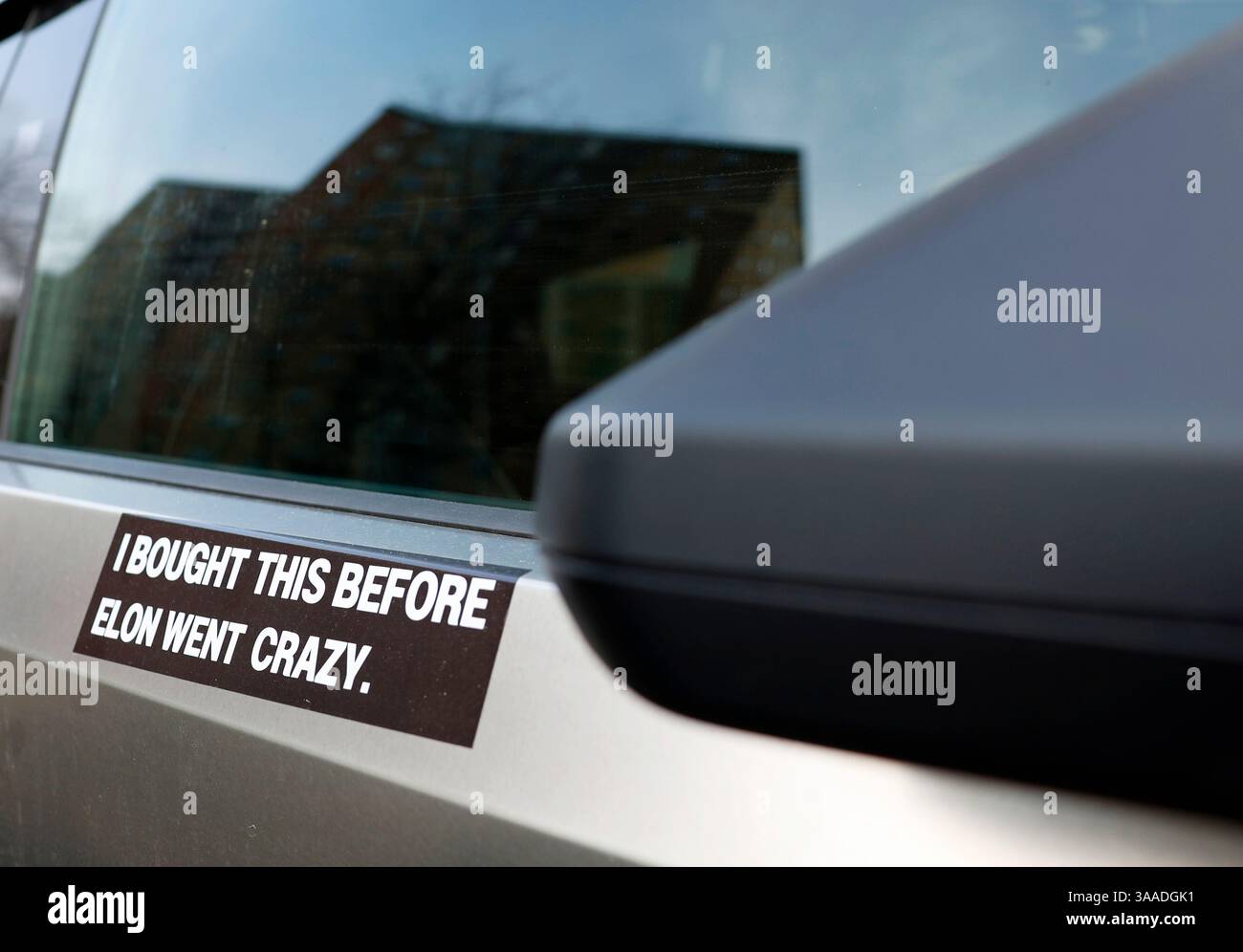 More than one "I Bought This Before Elon Went Crazy" sticker is adhered ...