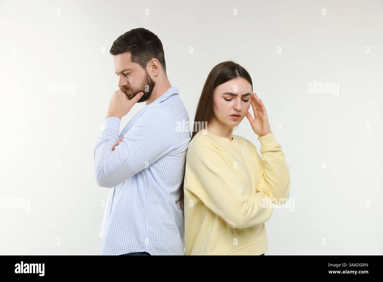 Resentful couple on light grey background. Relationship problem Stock ...