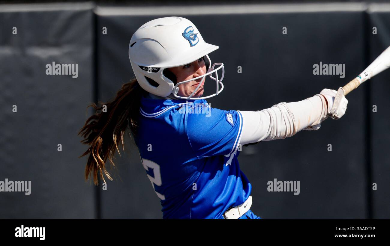 Creighton outfielder Hannah Poole (22) at bat during an NCAA softball ...