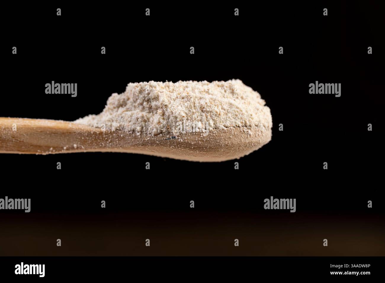 natural whole wheat flour with bran, fresh wheat flour close-up, flour ...