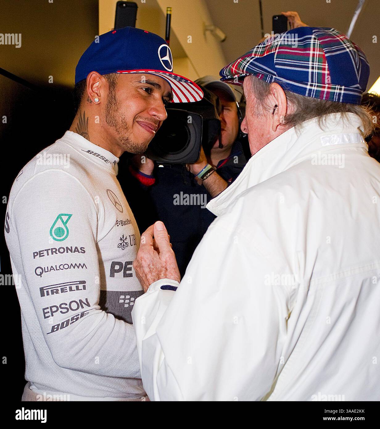 October 25, 2015: Lewis Hamilton (left) speaking with Sir Jackie ''The ...