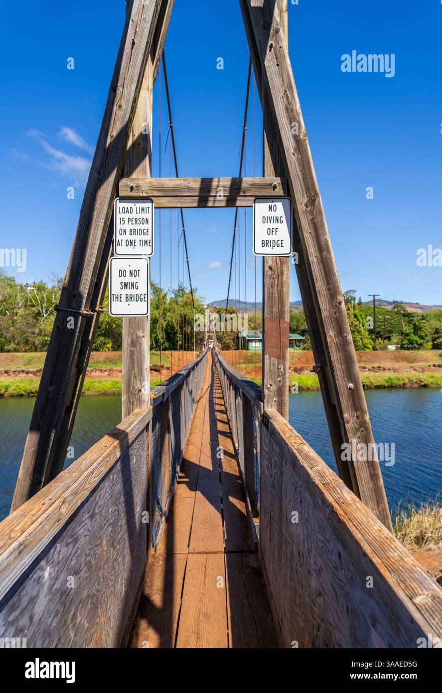 Structure of the historic wooden swinging bridge across the river in ...