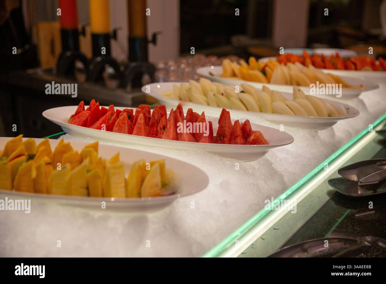 Buffet of Fresh Fruits on ice Stock Photo - Alamy