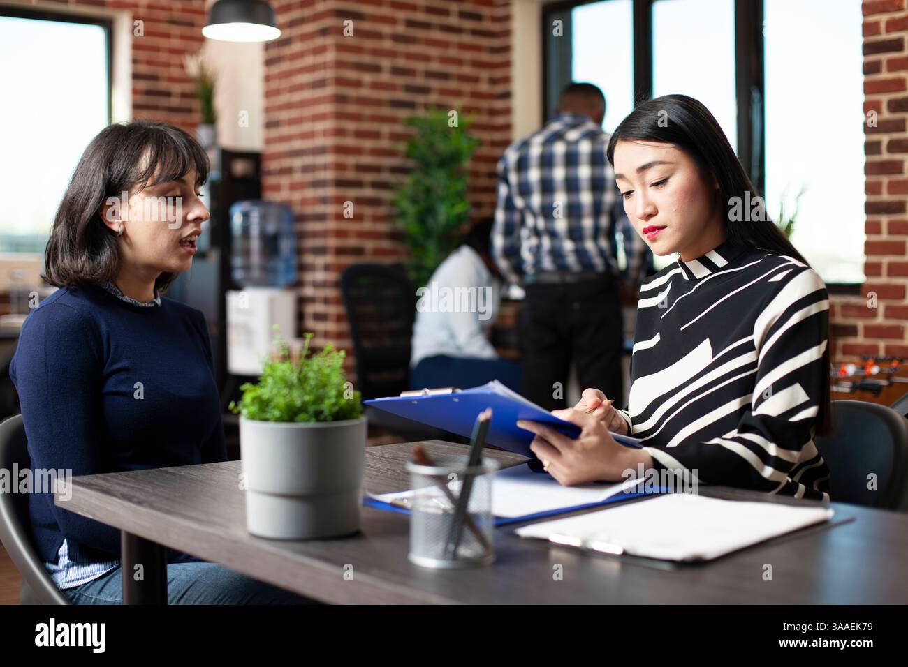 Candidate attending job interview application hi-res stock photography ...