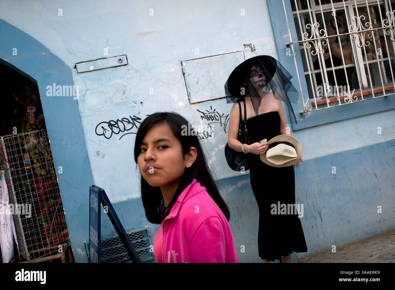 Oct 29, 2015 - Oaxaca, Mexico - Woman dressed up as La Catrina poses for a photograph near a ...