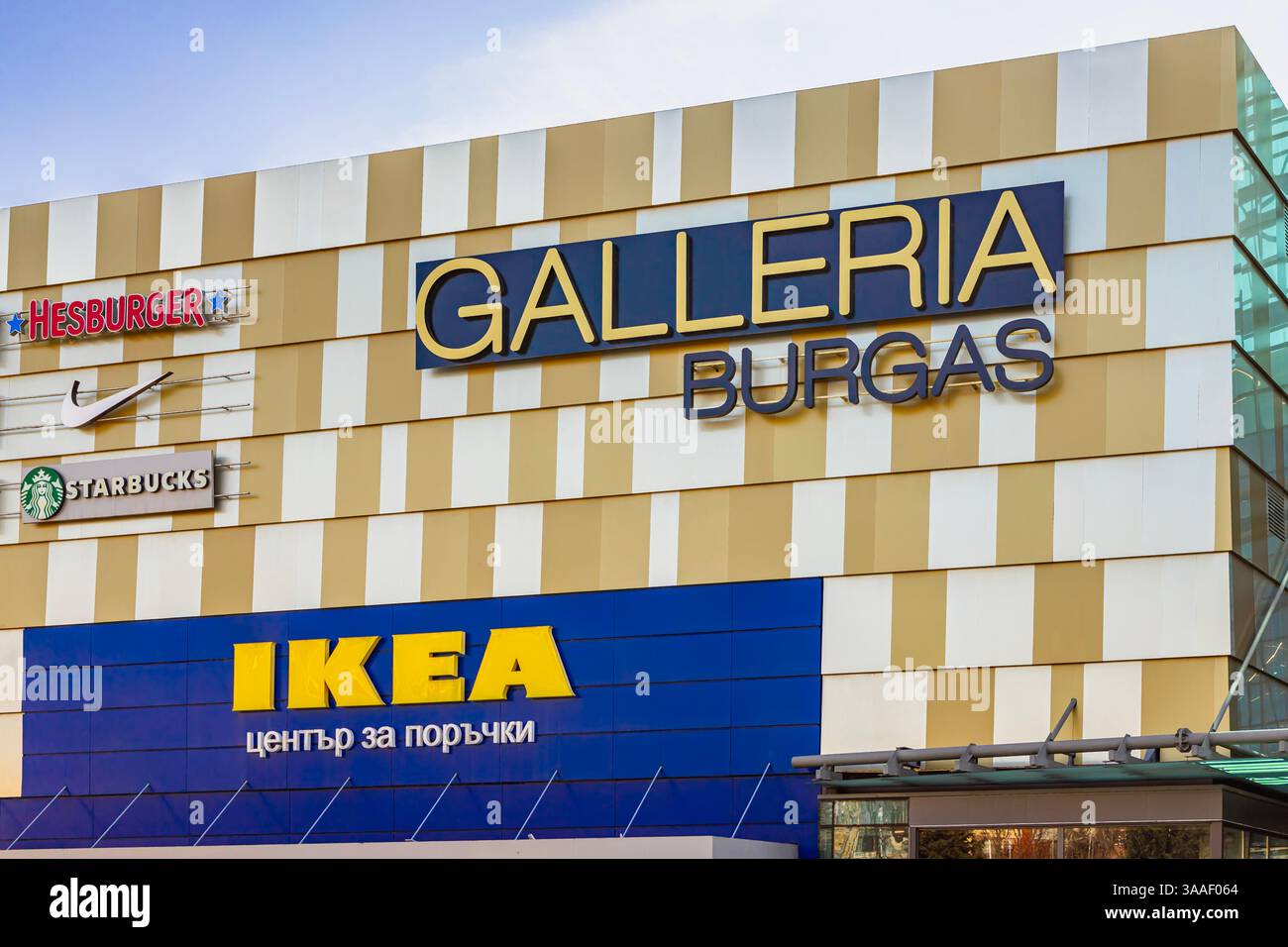 Shopping Mall Galleria Burgas. Facade with bold signs of global brands including IKEA, Nike and ...
