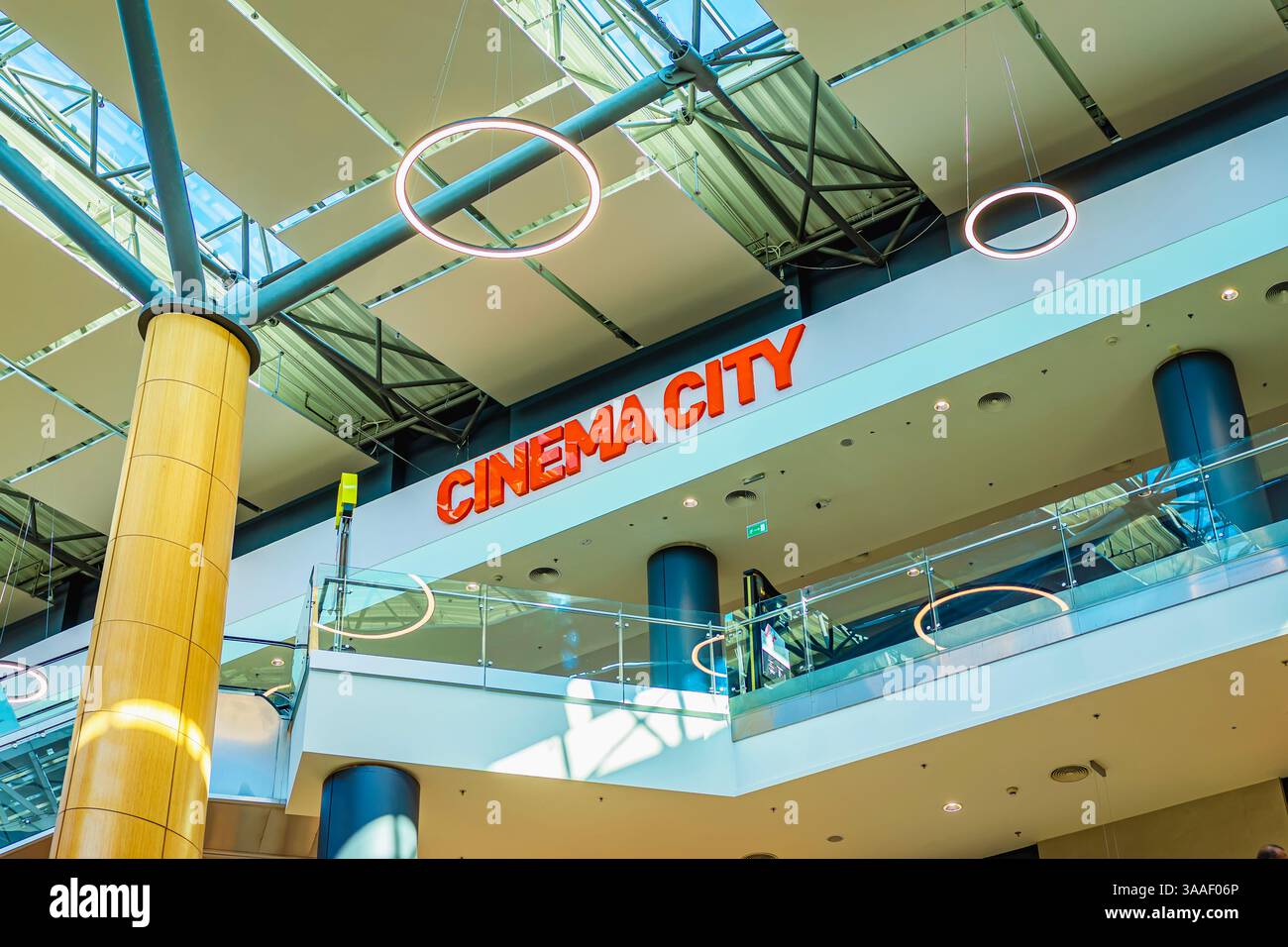 Modern city cinema. Modern mall interior with red Cinema City logo in ...