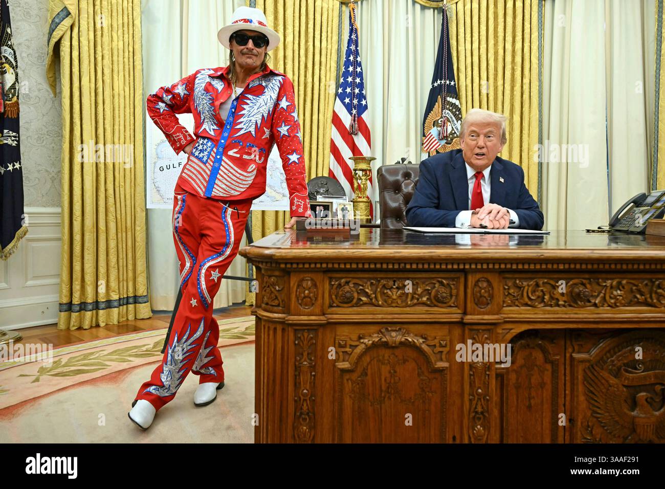 President Donald Trump speaks to reporters before signing an executive ...