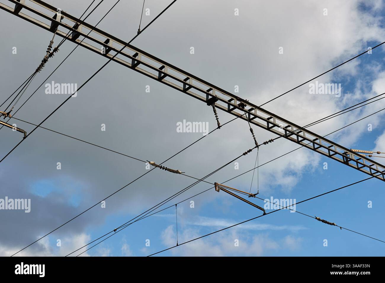 Overhead electric catenary wires of a railroad Stock Photo - Alamy